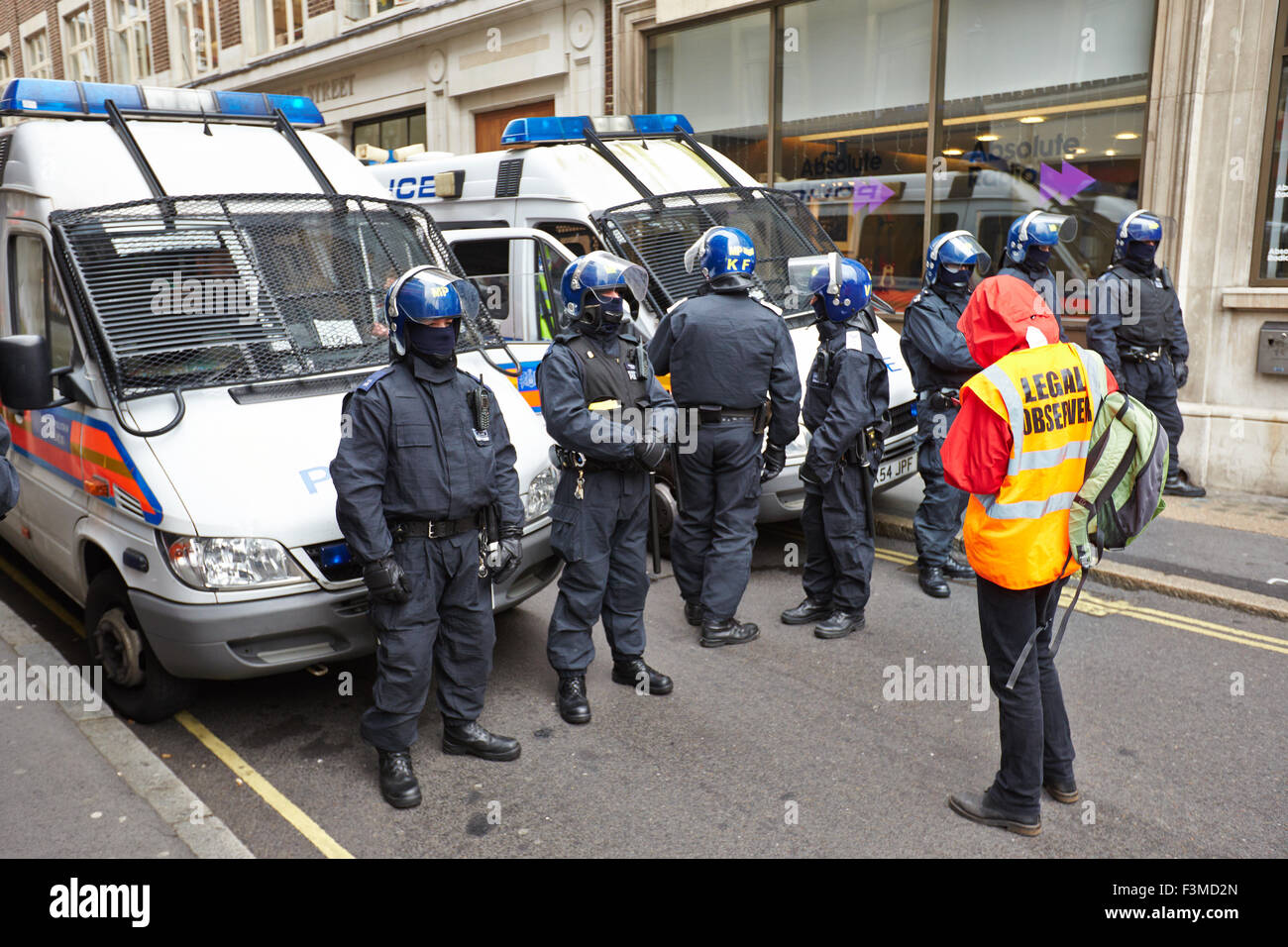 Police officers block a road during an anti G8 protest Stock Photo - Alamy