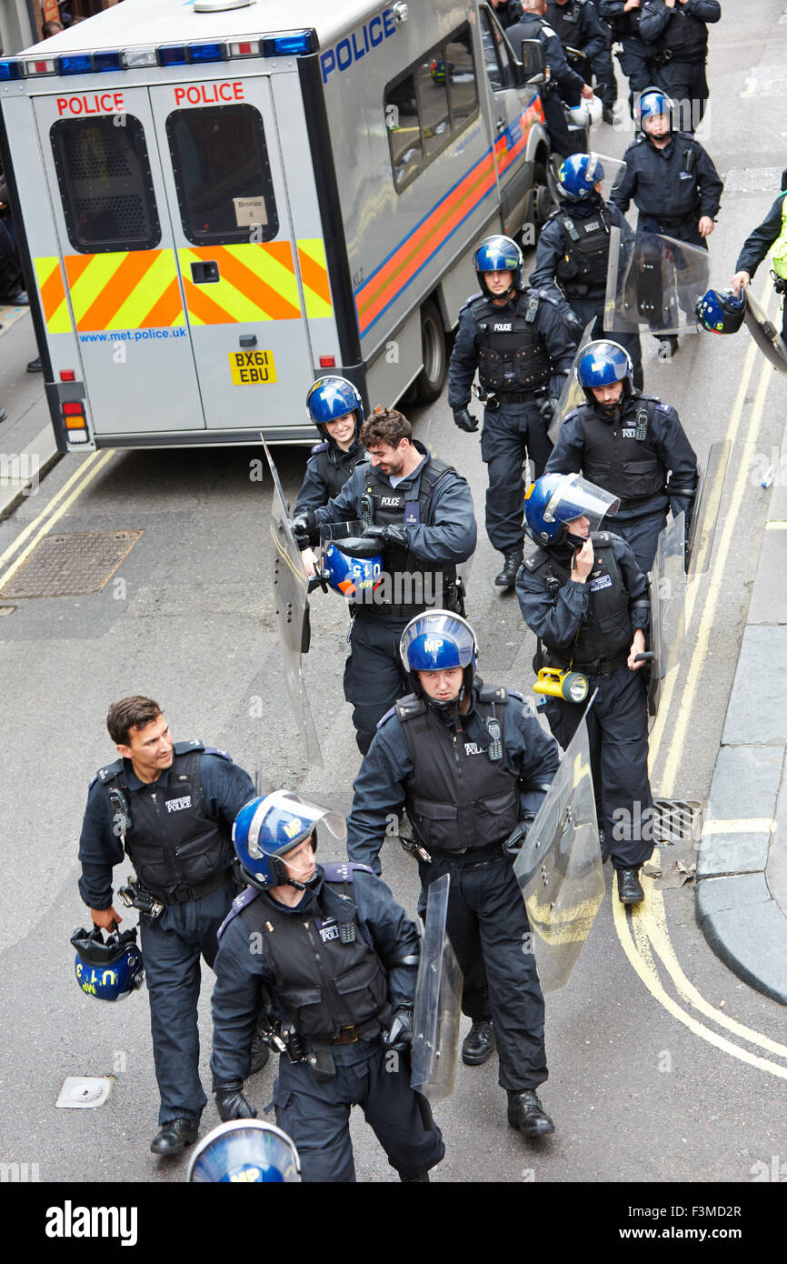Additional police officers arrive at the G8 protest in London Stock ...