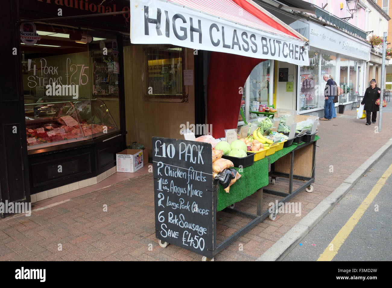 A butchers shop selling fruit and vegetables outside Stock Photo - Alamy