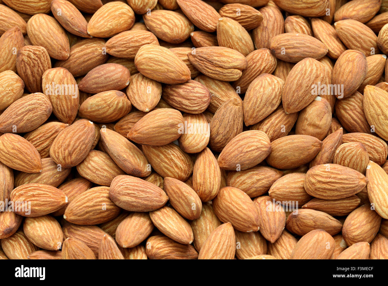 Almonds texture hi-res stock photography and images - Alamy
