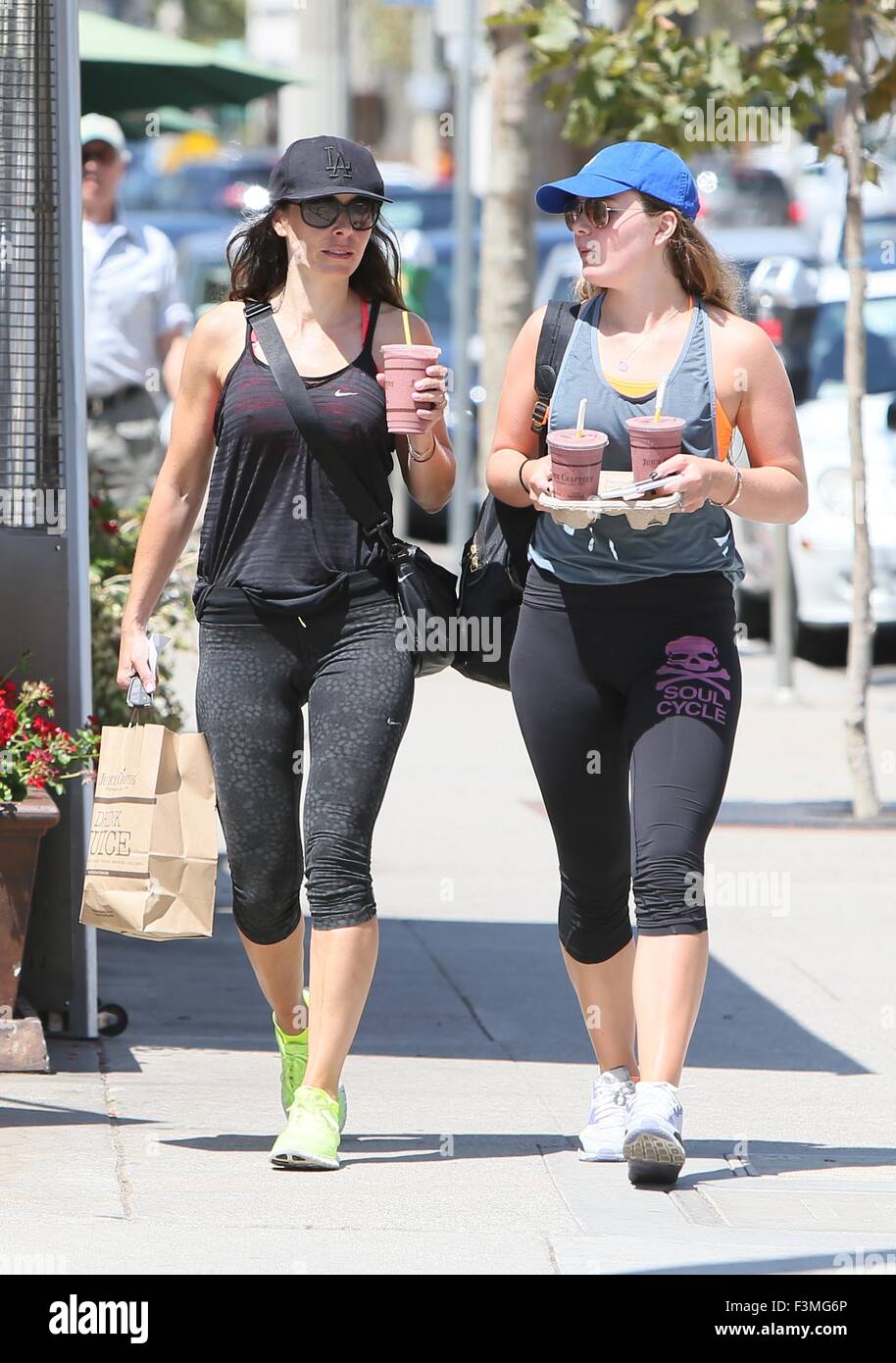 Tana Ramsay and Holly Ramsay pick up smoothies from Juice Crafters ...