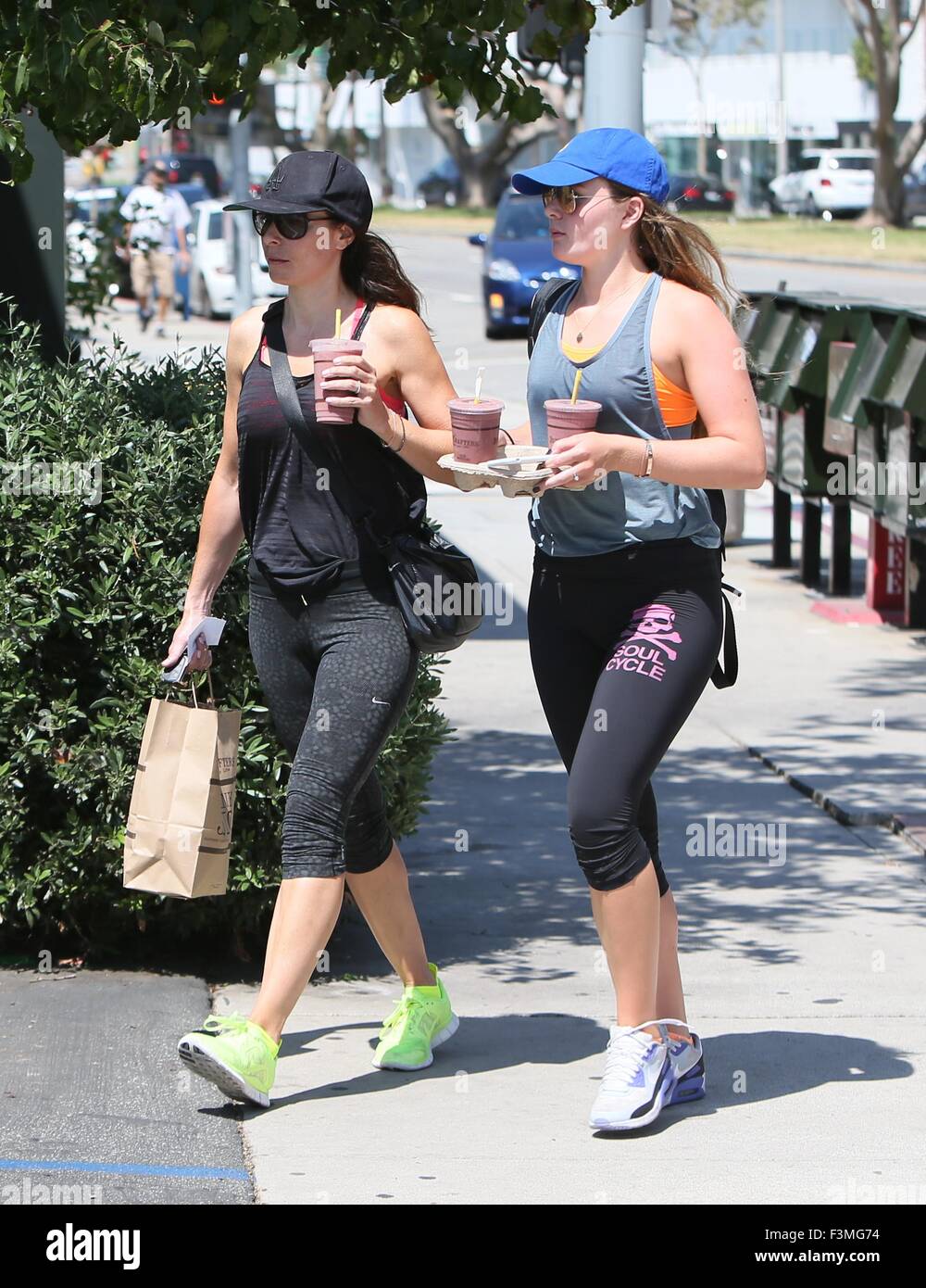 Tana Ramsay and Holly Ramsay pick up smoothies from Juice Crafters ...