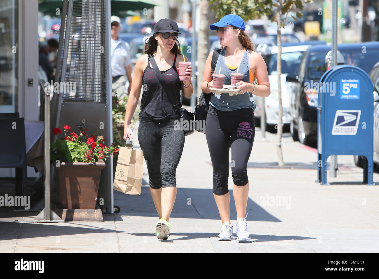 Tana Ramsay and Holly Ramsay pick up smoothies from Juice Crafters ...