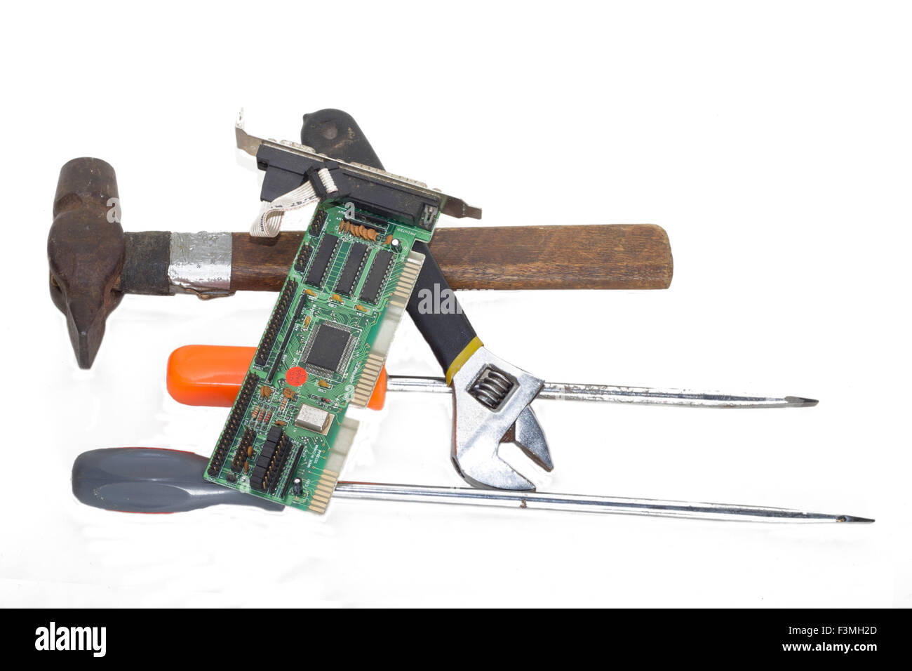 Computer repair on a white background Stock Photo - Alamy