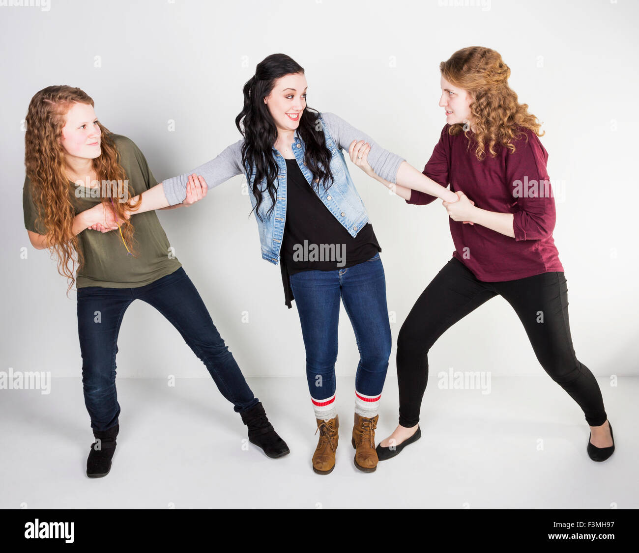 Diverse people fighting on white hi-res stock photography and images ...