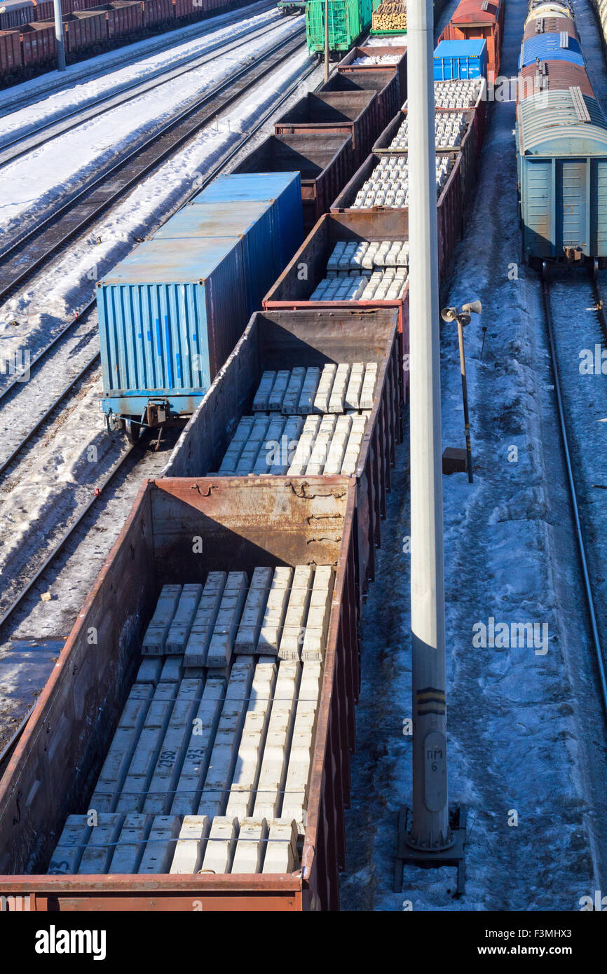 Freight cars in cargo port in the early spring Stock Photo - Alamy