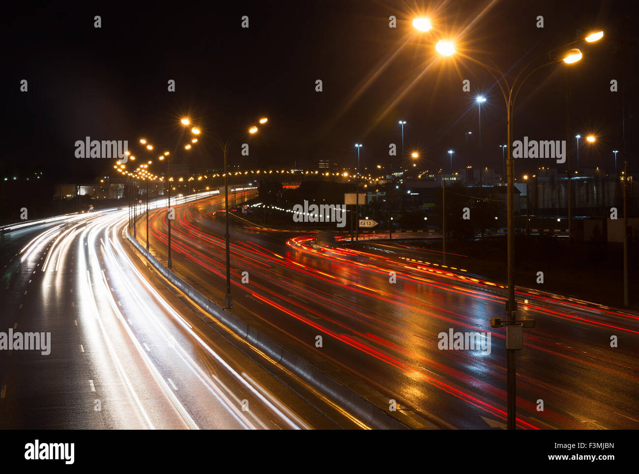Illuminated highway at night with light trails Stock Photo - Alamy