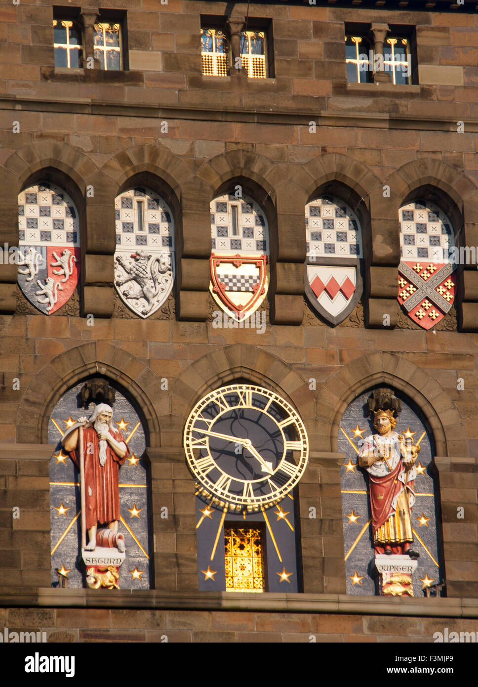 Cardiff Castle face of clock on tower with clock flanked by figures of ...