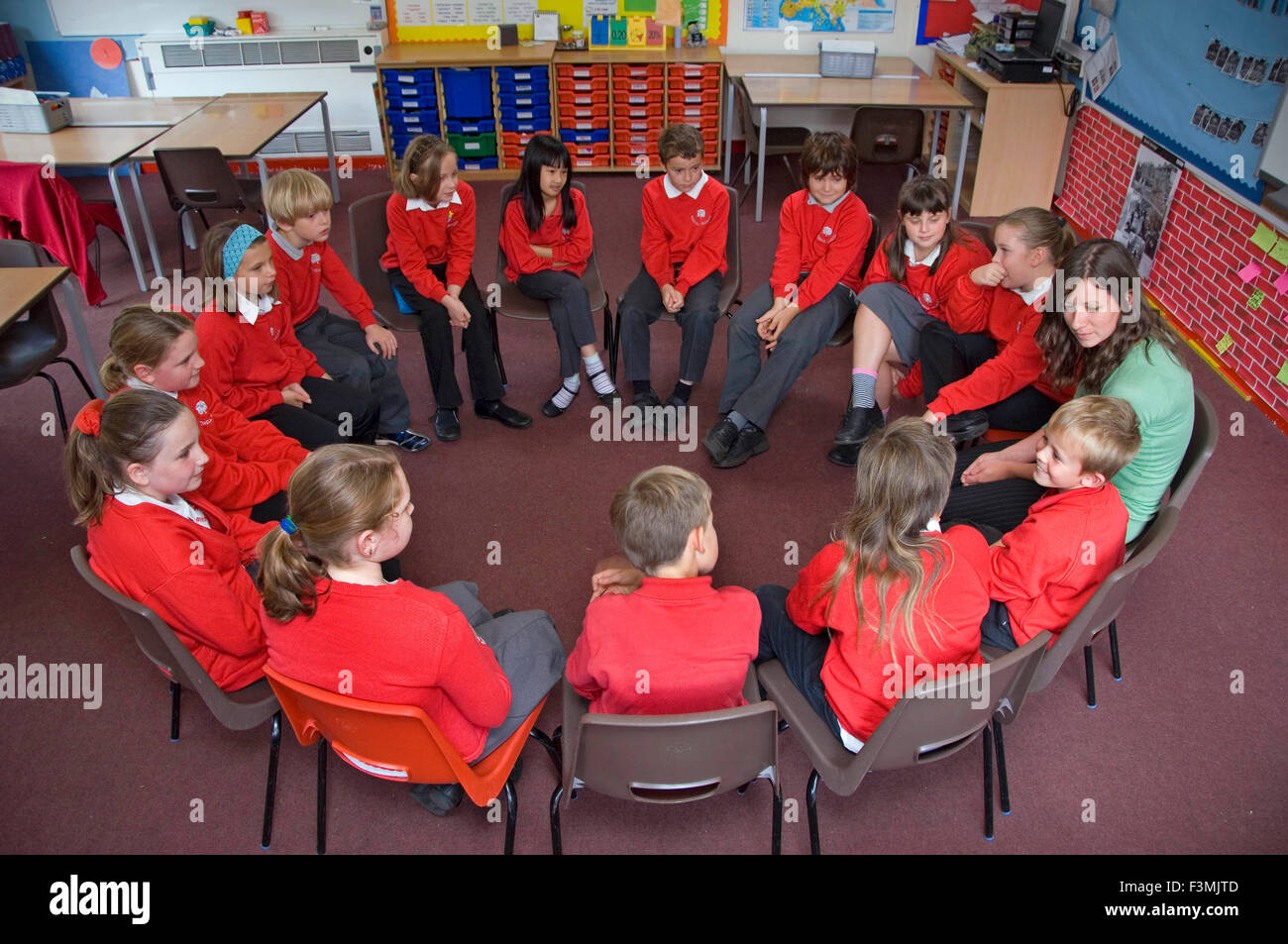 A check-in session for pupils in red uniforms at Birdwell Primary ...