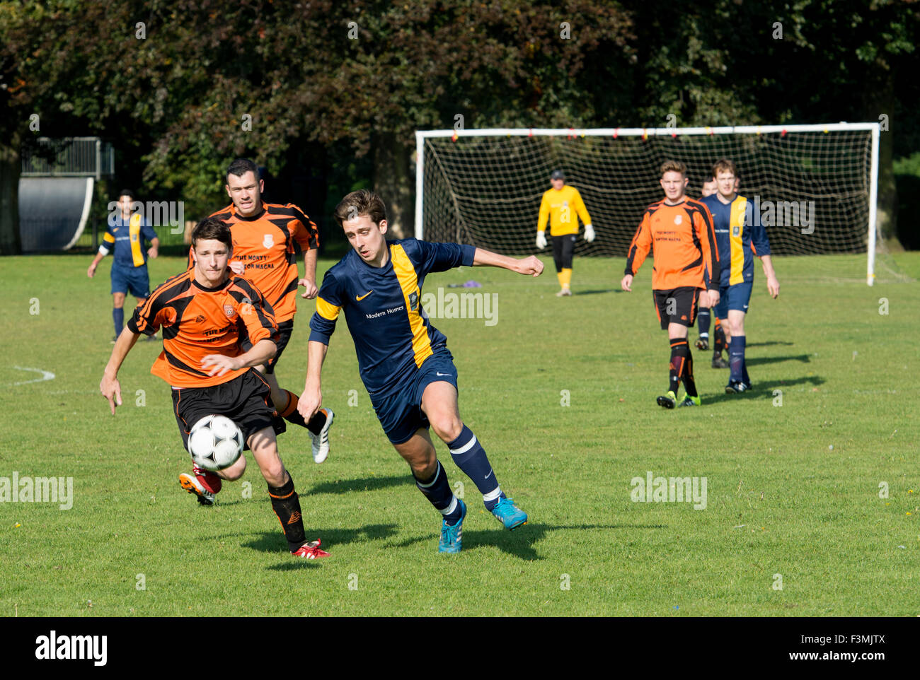 Football park playing uk men hi-res stock photography and images - Alamy