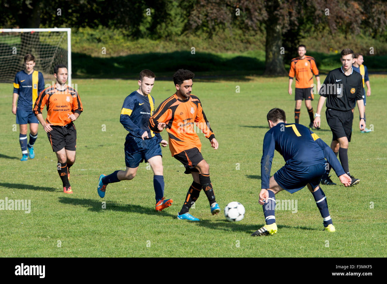 Football park playing uk men hi-res stock photography and images - Alamy