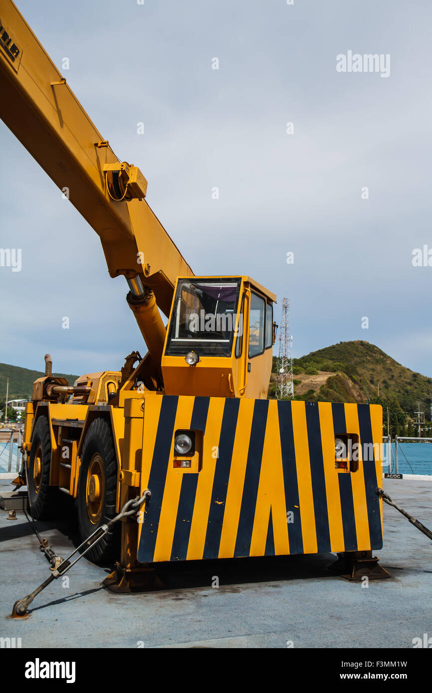 Yellow Crane truck Stock Photo - Alamy