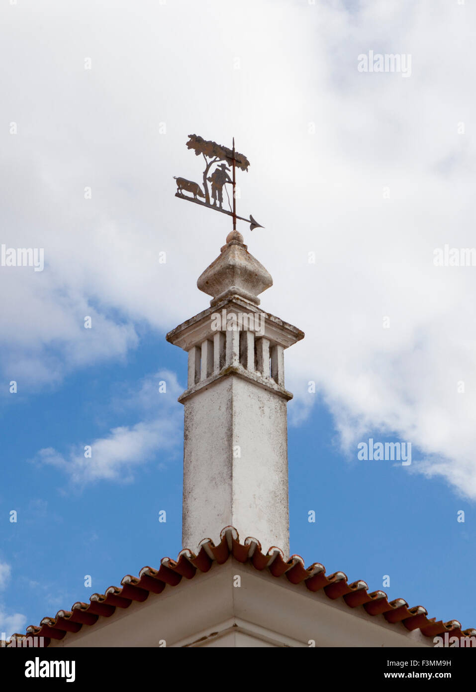 Weather-vane with the shape of a pig with swineherd under oak tree over ...