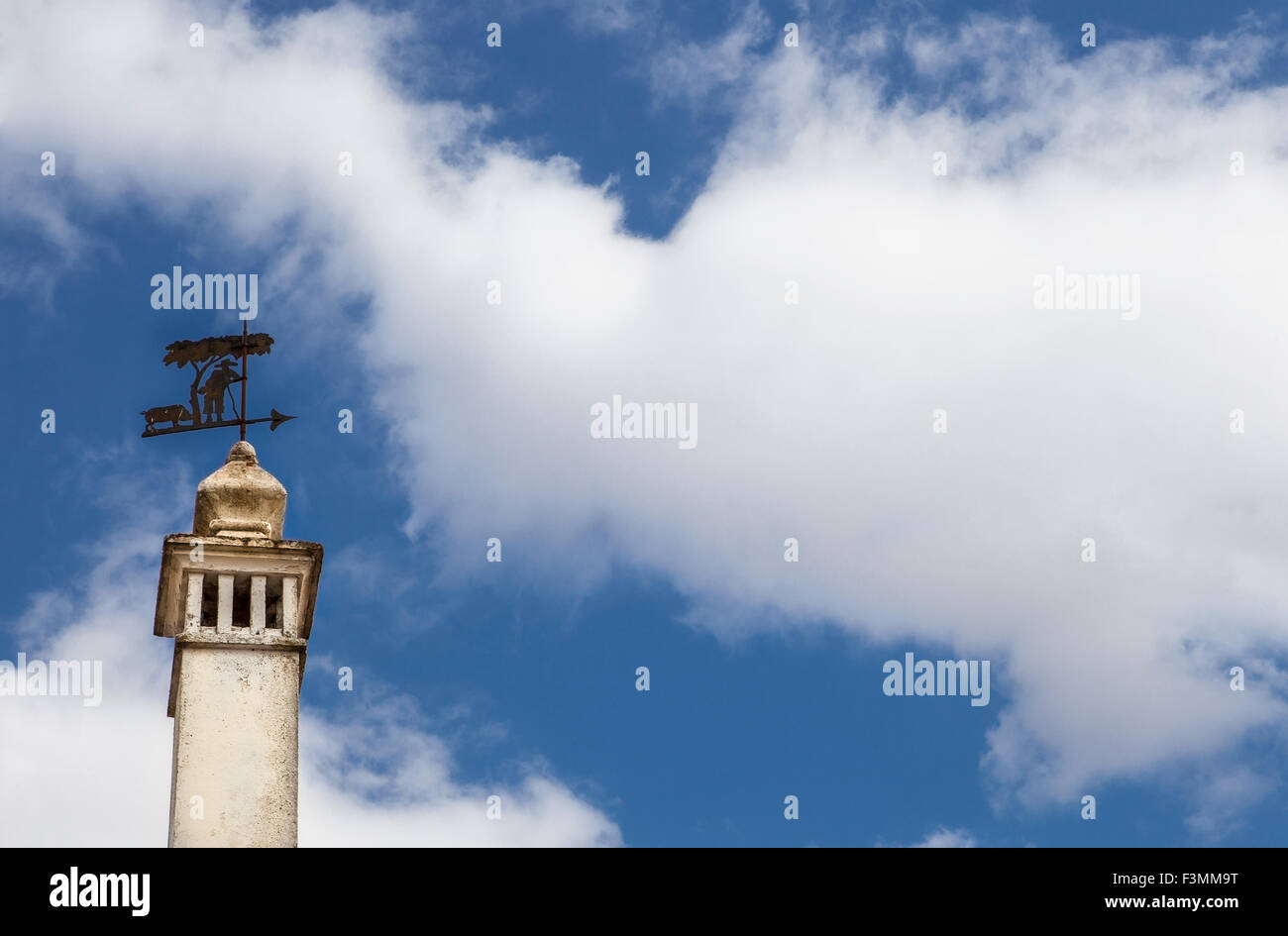 Weather-vane with the shape of a pig with swineherd under oak tree over ...