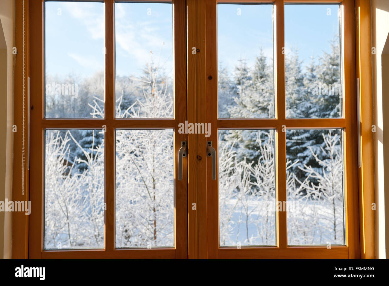 Early morning frosty winter, view through a window Stock Photo - Alamy