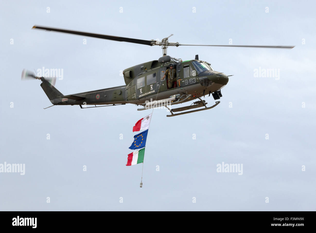 Italian Agusta Bell AB-212 flying the flags of Malta, Europe and Italy ...