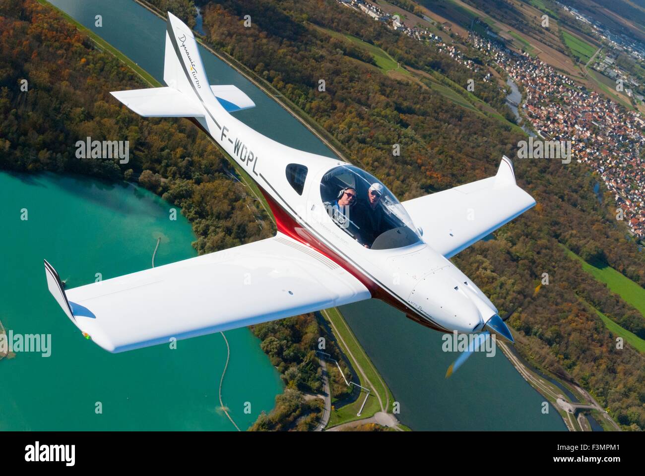 France, Bas Rhin (67), Aerospool Dynamic plane flying near Rhine river ...