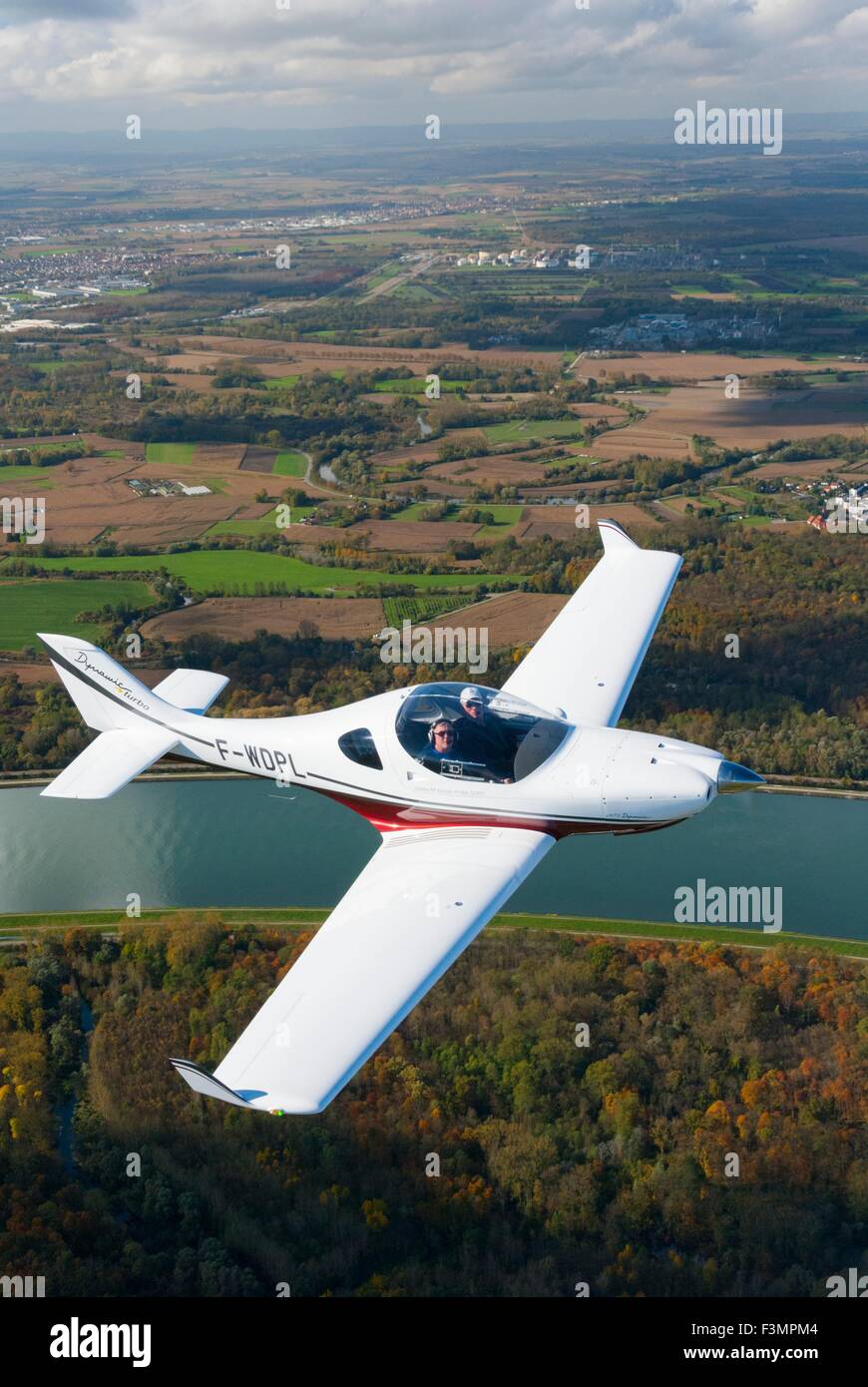 France, Bas Rhin (67), Aerospool Dynamic plane flying near Rhine river ...