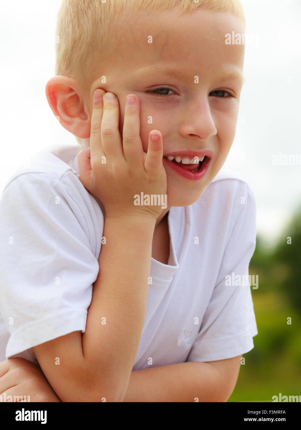 Boy leaning forward hi-res stock photography and images - Alamy