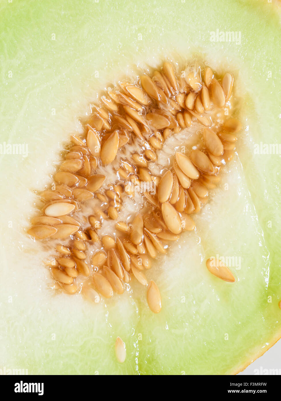 Closeup of melon with pips as food background. Fruit, diet and healthy ...