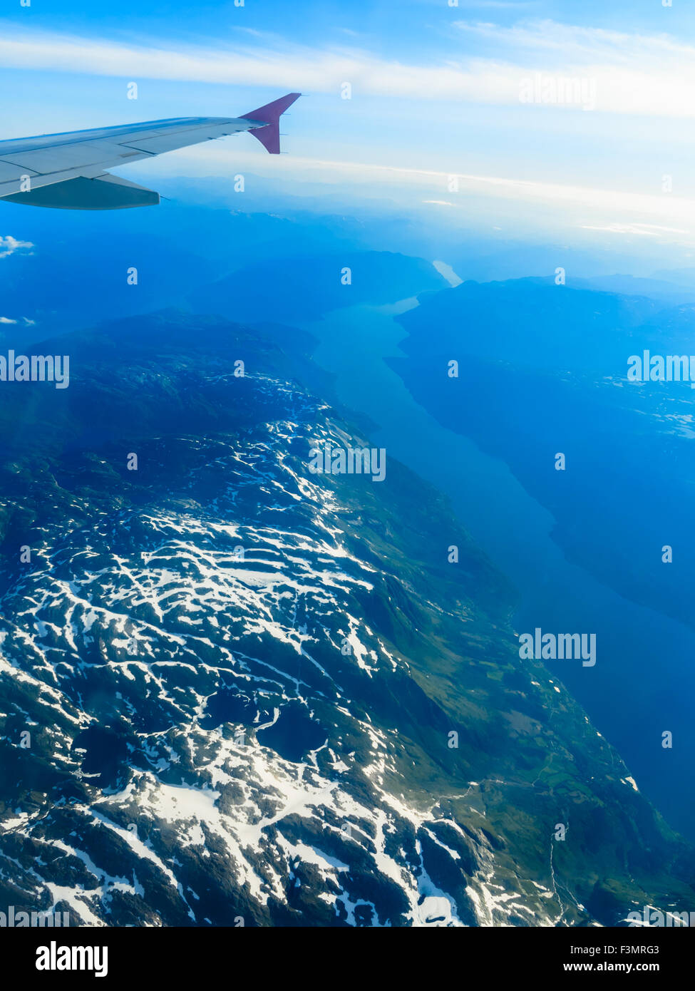 Birds eye. View from window of plane airplane flying over Norway ...