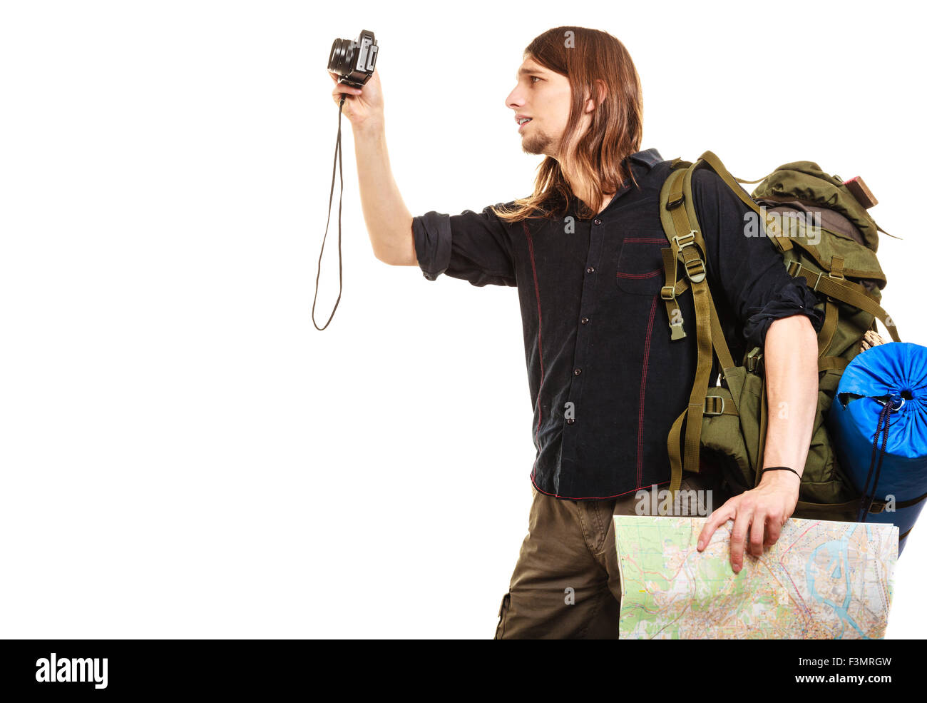 Man tourist backpacker taking photo picture with camera. Young guy ...