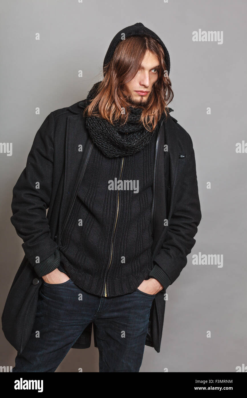 Man wearing long coat hi-res stock photography and images - Alamy