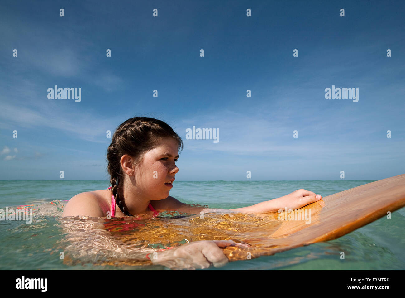 Girl with boogie board hi-res stock photography and images - Alamy