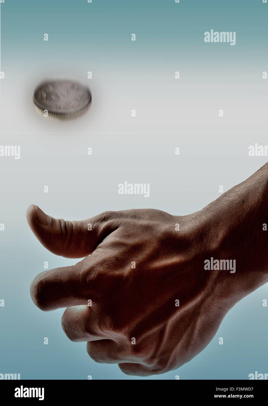 Coin tossing hi-res stock photography and images - Alamy