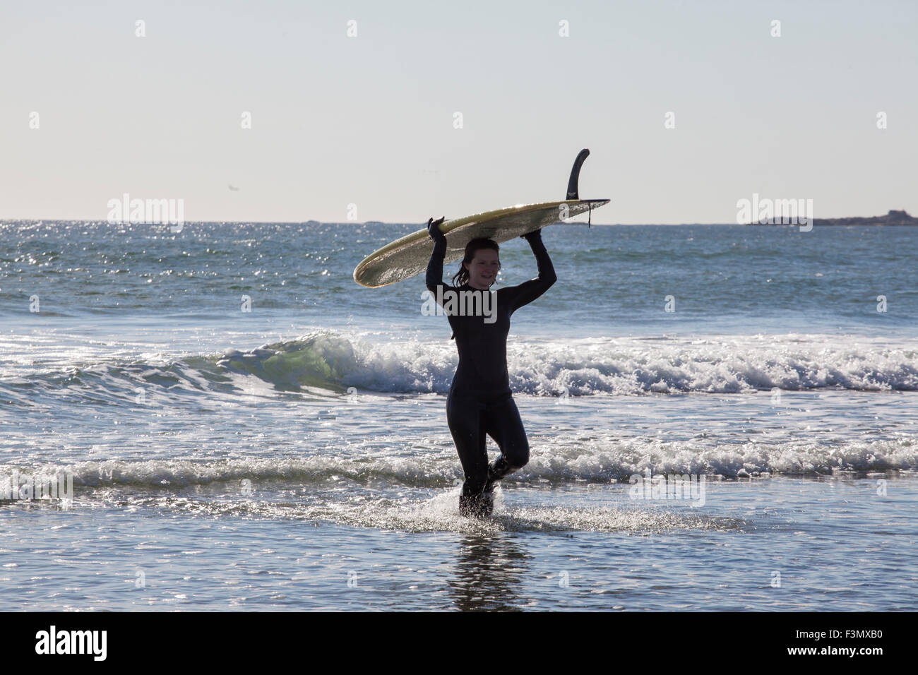 Surfer girl with surfboard hi-res stock photography and images - Alamy