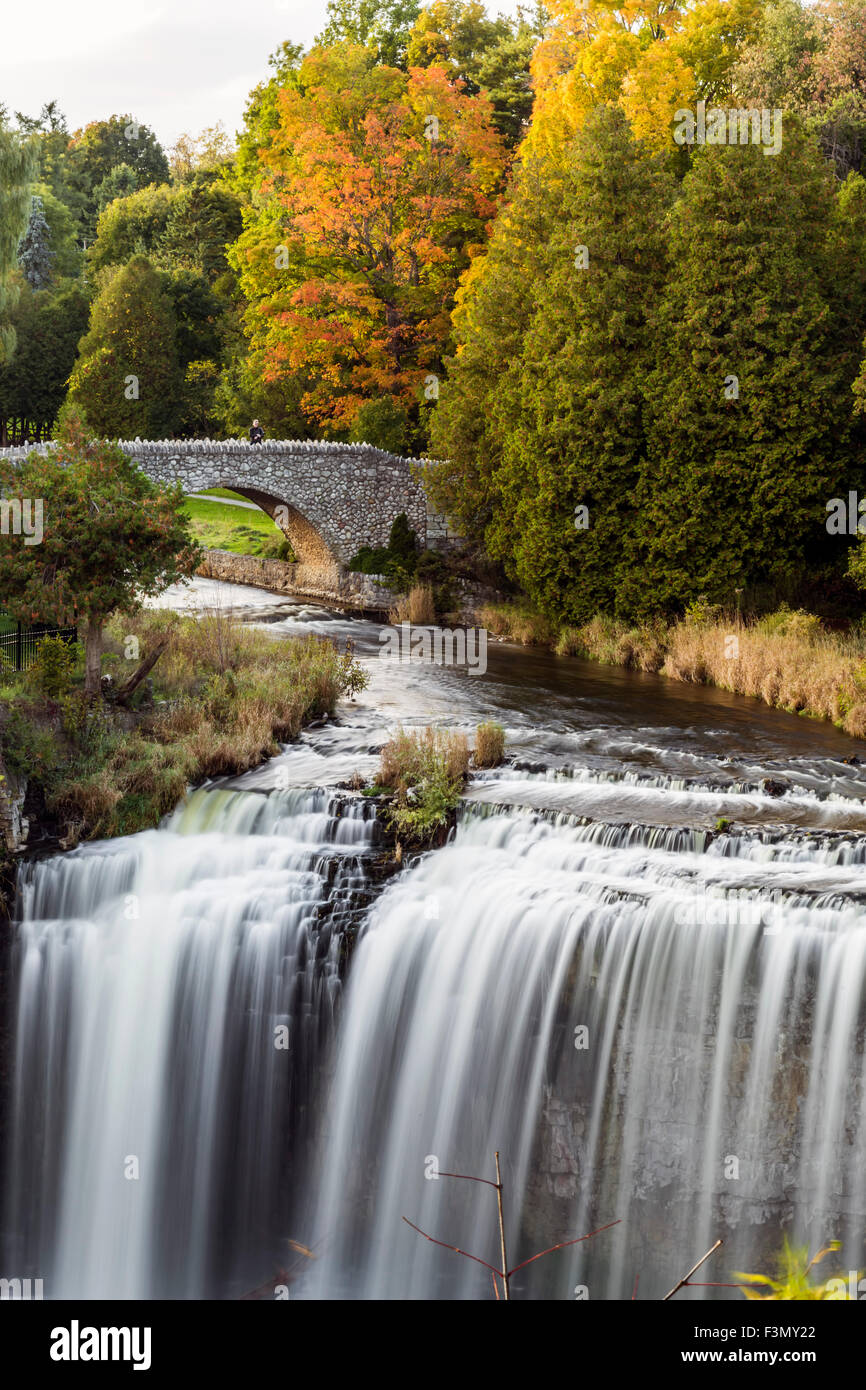 Websters Falls in autumn with stone bridge Stock Photo - Alamy