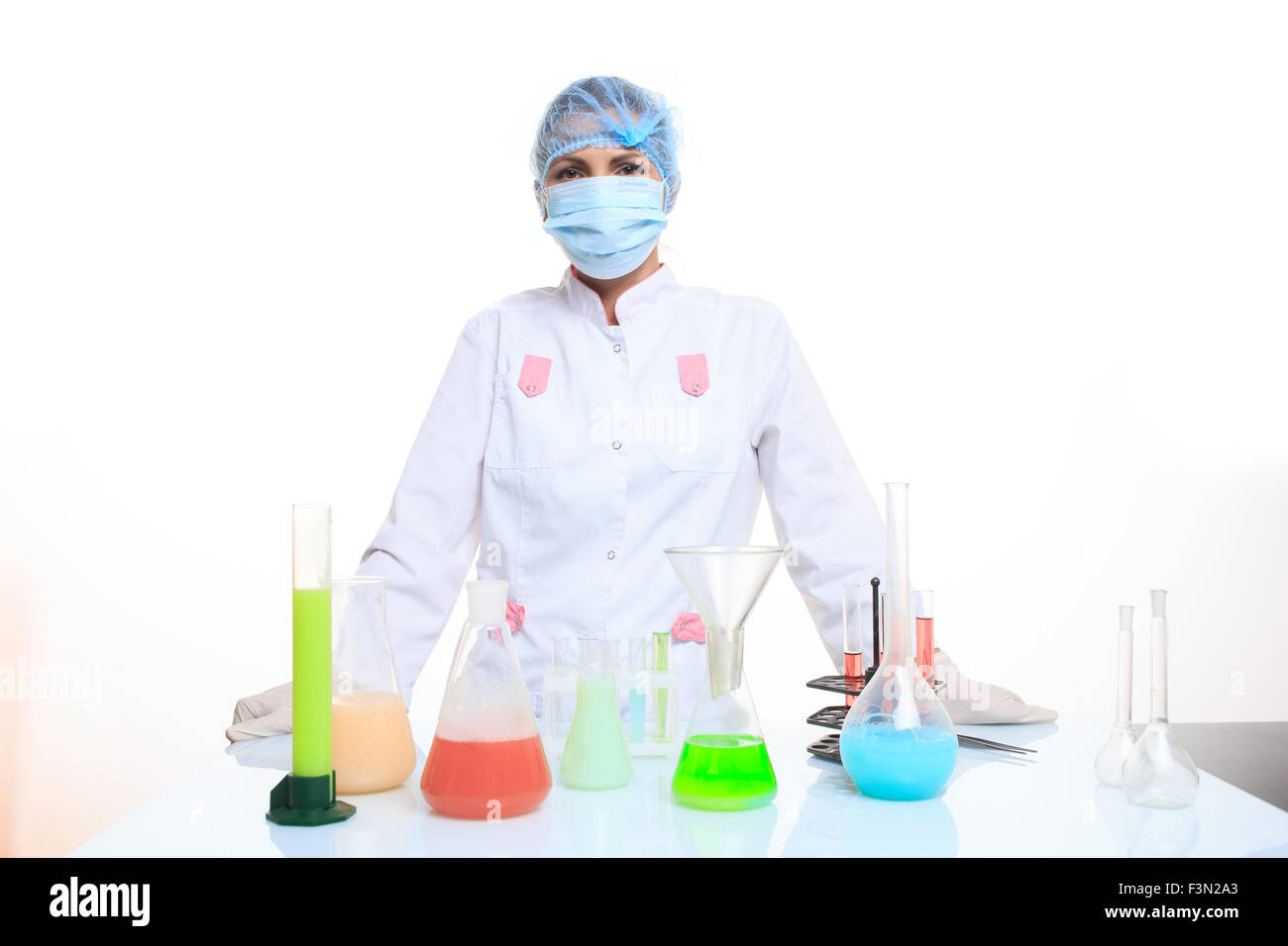 Woman working flasks in laboratory hi-res stock photography and images ...