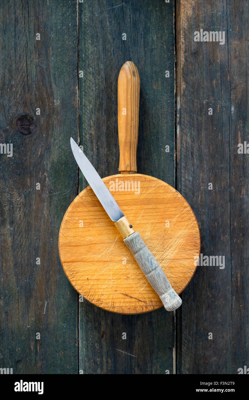 Cutting board with kitchen knife Stock Photo - Alamy