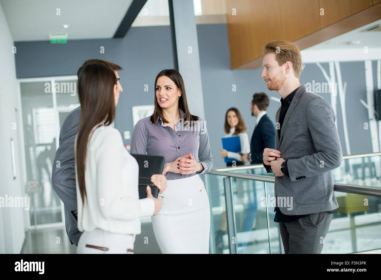 Young people in the office Stock Photo - Alamy