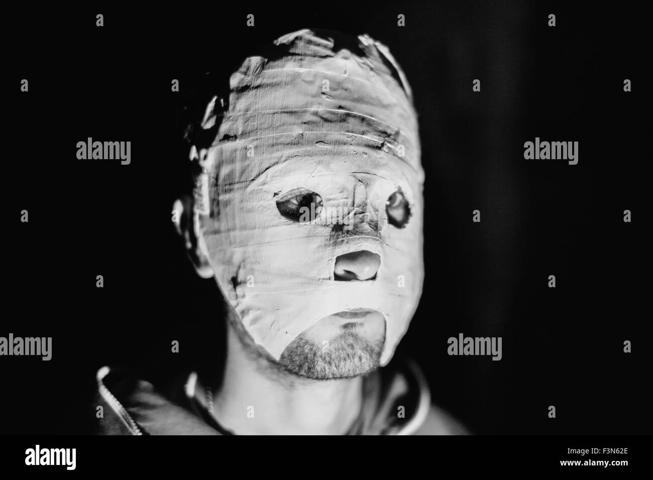 Black and white photo of a maniac in a mask closeup Stock Photo - Alamy