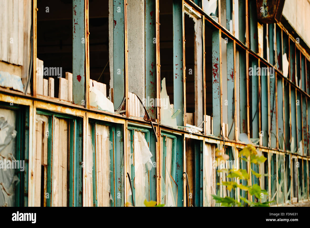 Broken facade of the building. Side view Stock Photo - Alamy