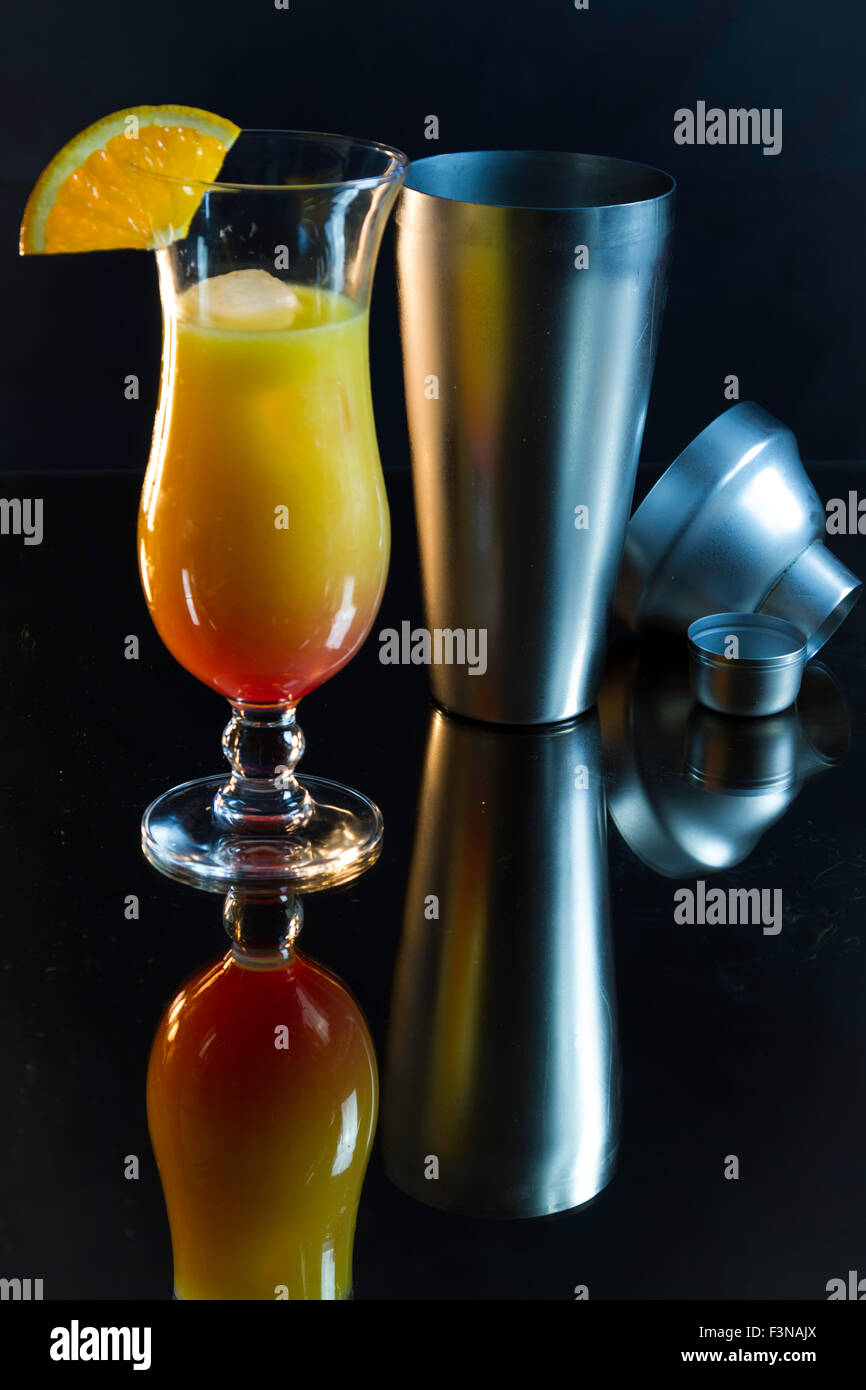 Tequila Sunshine Cocktail accompanied by shaker Stock Photo - Alamy