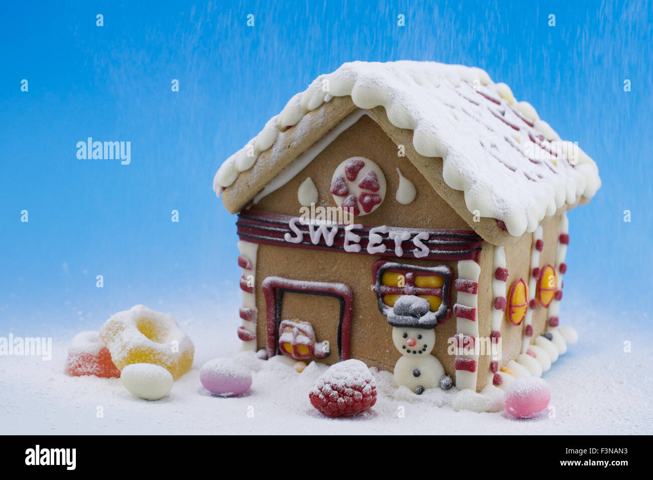 Gingerbread house and other sweets Stock Photo - Alamy