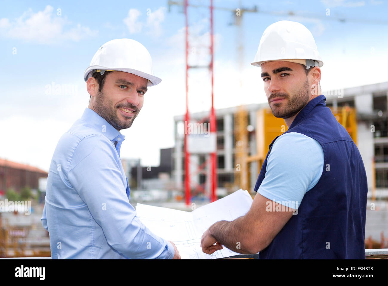 Engineer checking blueprint work hi-res stock photography and images ...