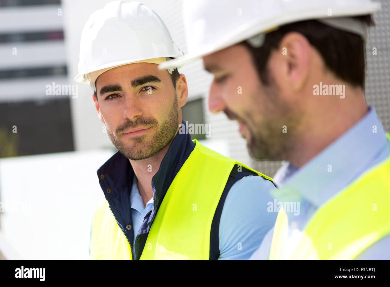 View of an attractive worker on a construction site Stock Photo - Alamy