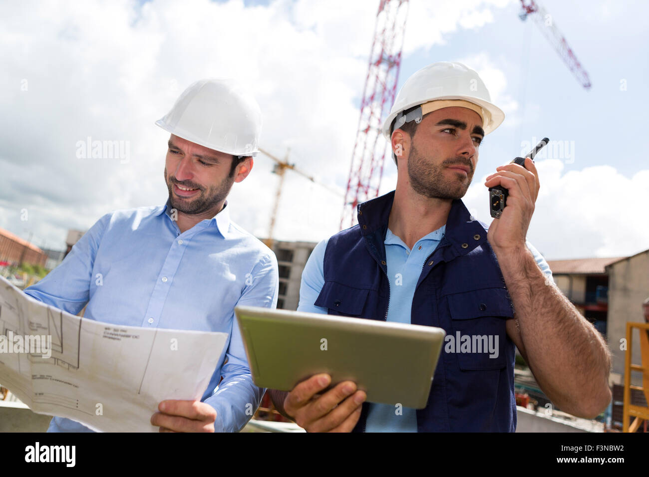 Worker watching hi-res stock photography and images - Alamy