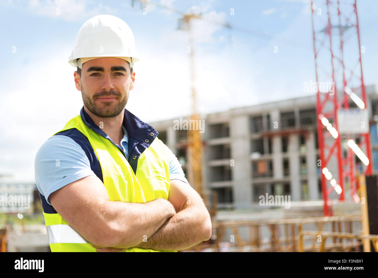View of an attractive worker on a construction site Stock Photo - Alamy