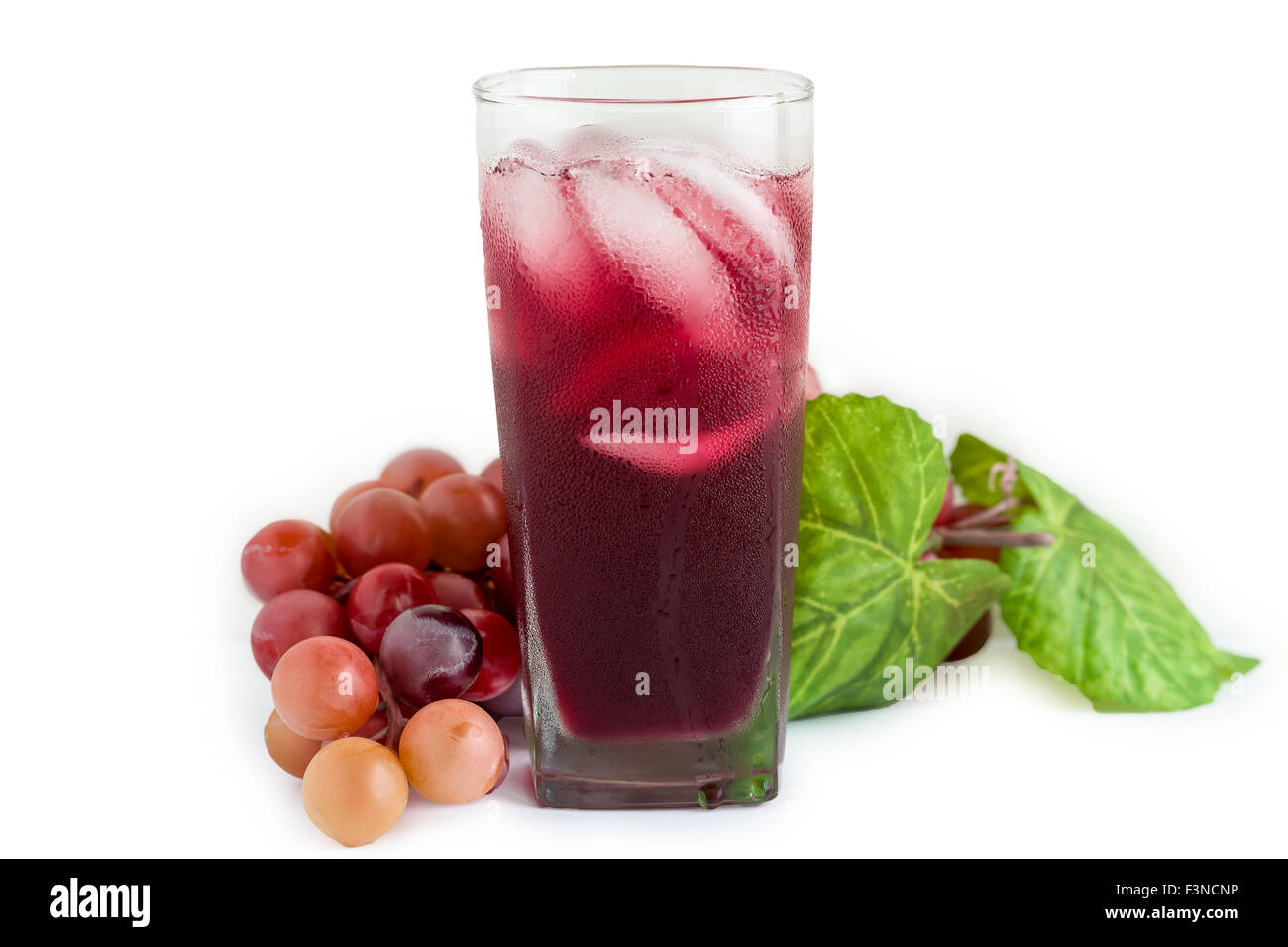 Cool grape juice for refreshment on isolated white background Stock ...