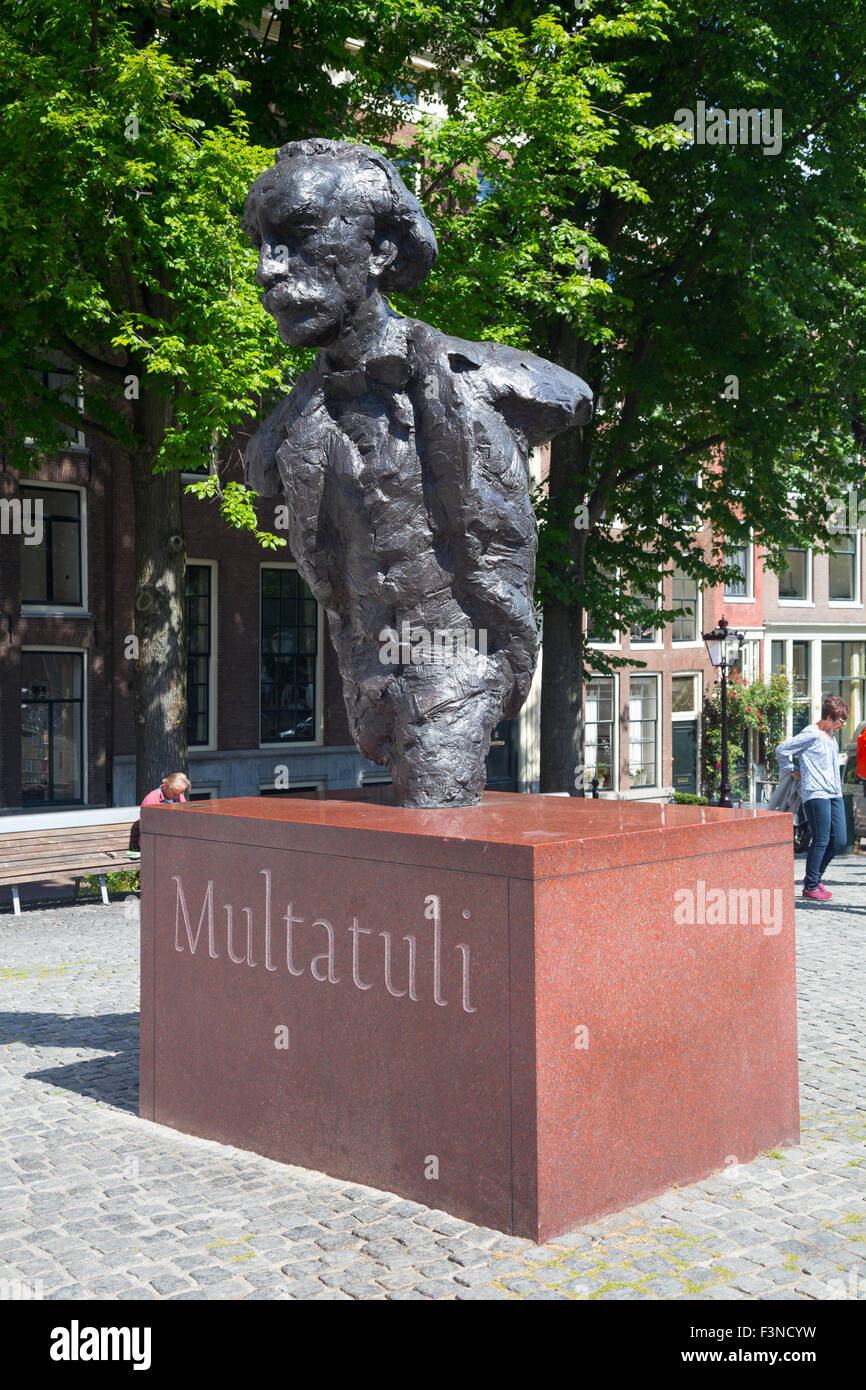 Bronze statue of Multatuli on a square over the Singel canal in ...
