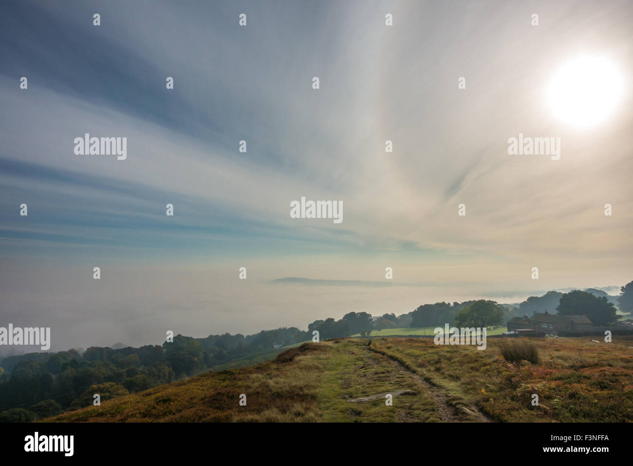 A cloud inversion in the valley and a sun halo in the sky, Wharfedale ...