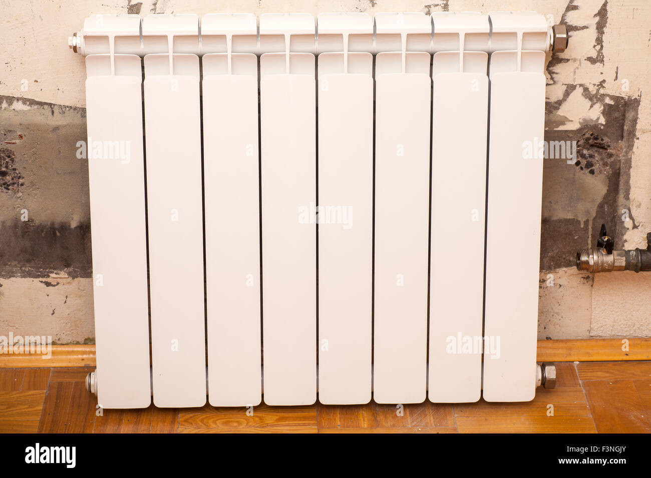 installation of radiator Stock Photo - Alamy