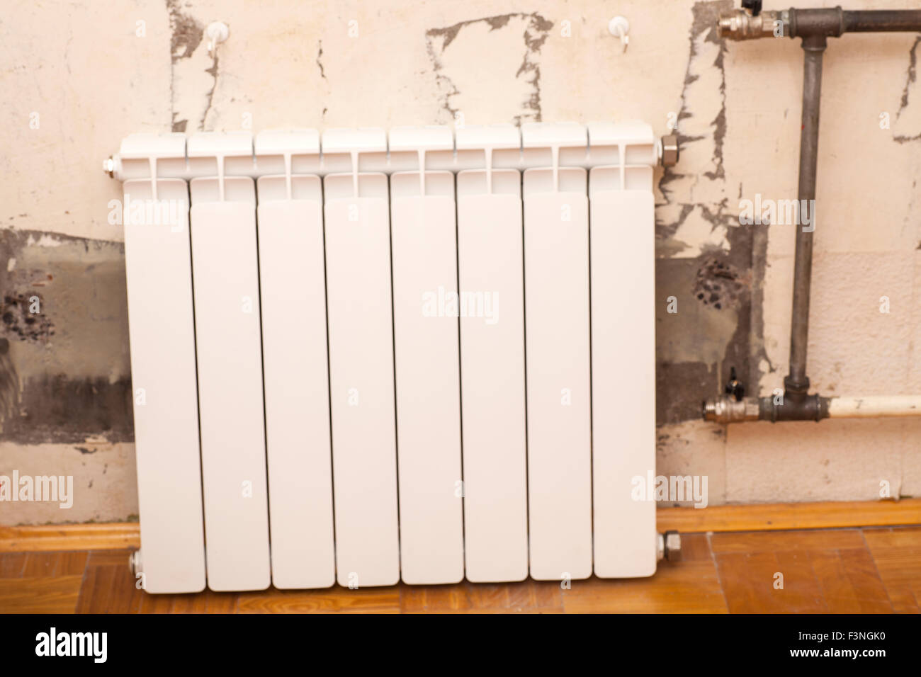 Radiator installation hi-res stock photography and images - Alamy