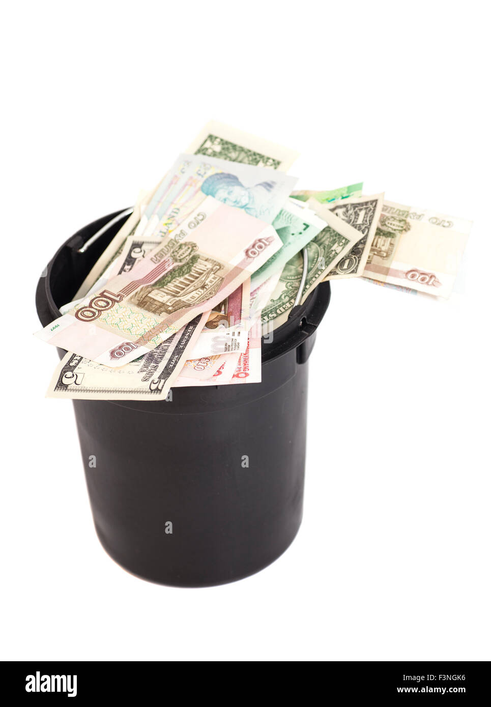 bucket with money over white background Stock Photo - Alamy