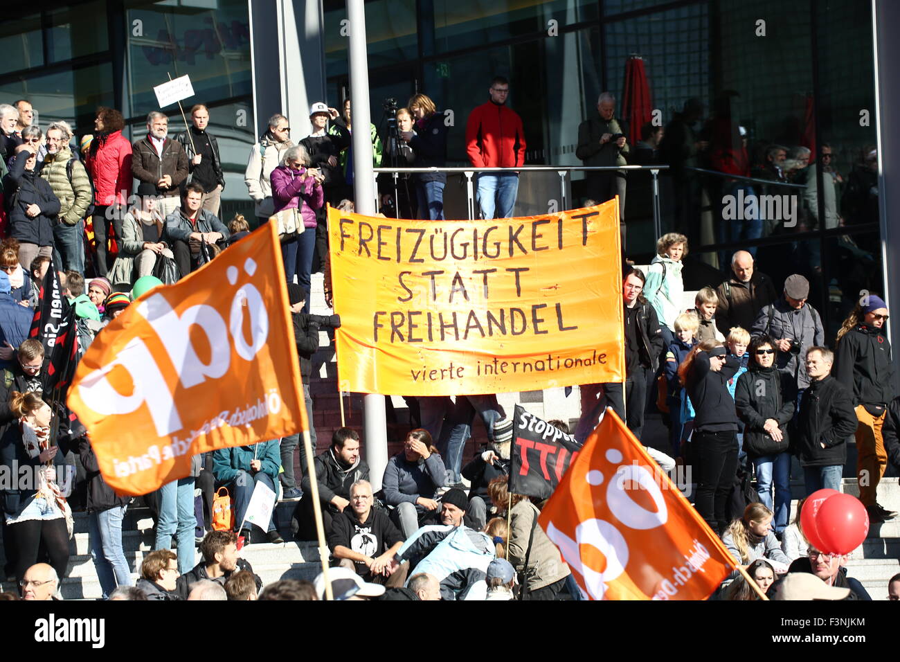 Berlin, Germany. 10th Oct, 2015. Thousands of protesters bring banners ...
