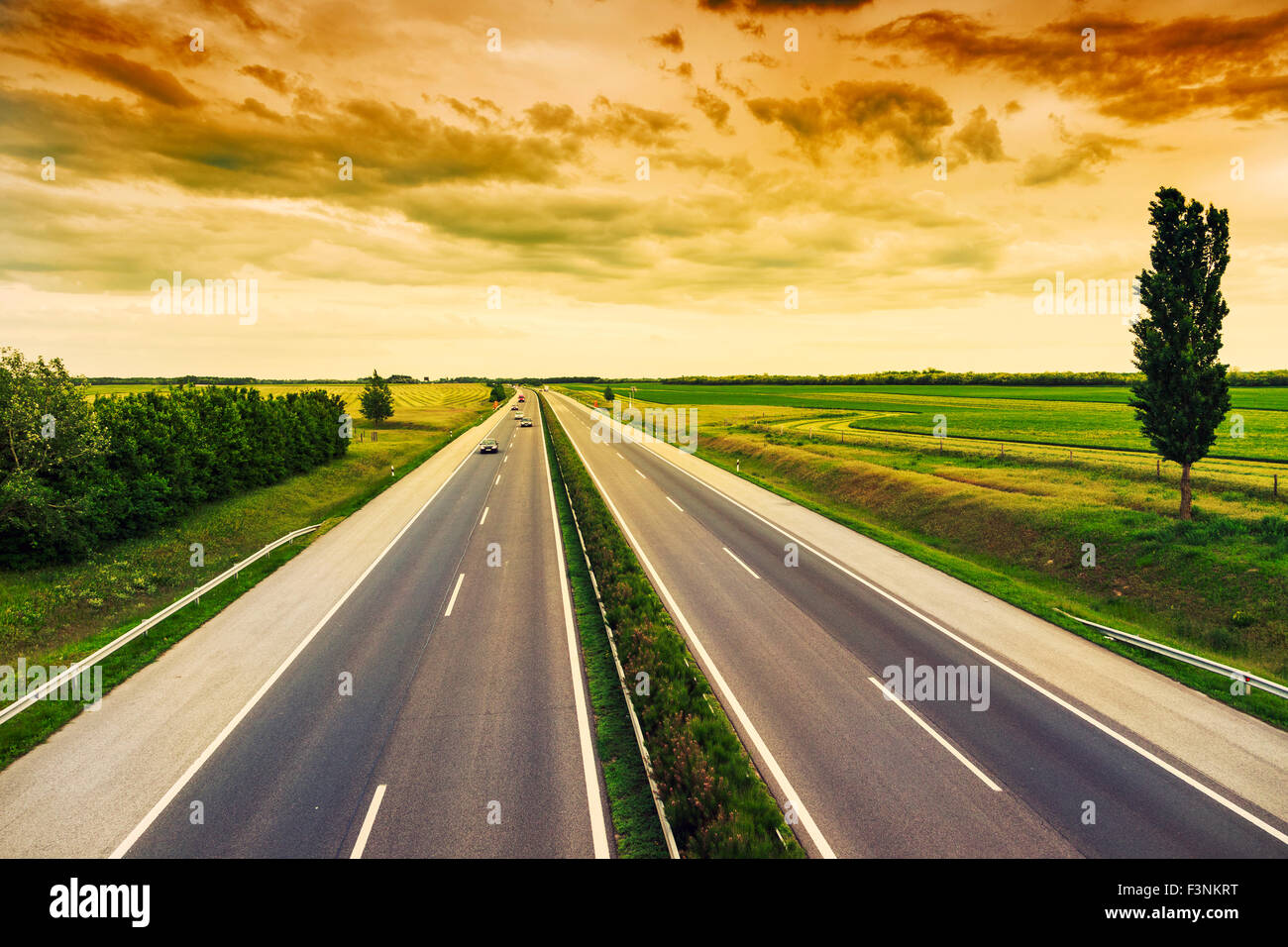 Hungarian highway in stormy day in meadow Stock Photo - Alamy
